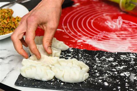 Hand Molding Dough With Meat Woman Sculpt Dumplings With Her Hands