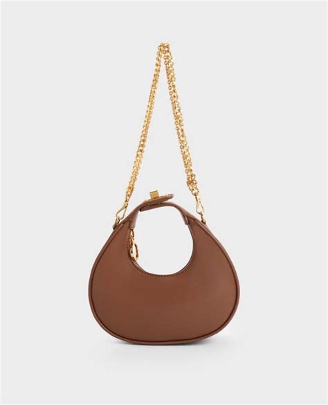 Charles And Keith Mini Crescent Hobo Bag On Carousell