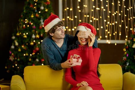 Man Blindfold His Lover And Hold The Present To Make Surprise To Her