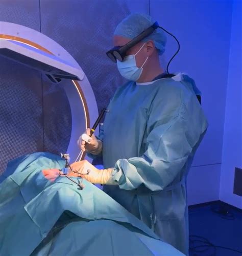 Pedicle Screw Placement Using An Augmented Reality Head Mounted Display In A Porcine Model