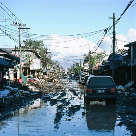 The Devastation Caused By A Typhoon Including Flooded Streets And