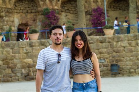 Premium Photo Portrait Of Couple Standing At Park Guell