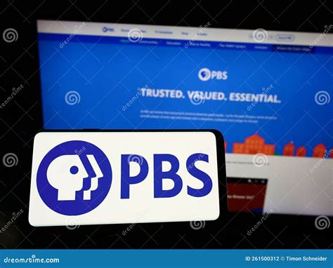 Person Holding Smartphone With Logo Of Us Tv Network Public