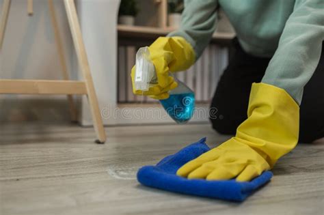 The Wife Is Cleaning Her Husband Home Office Cleanup The Room Wearing