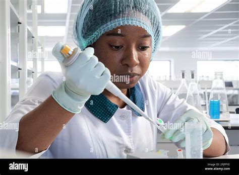African Female Scientist Working Laboratory Research Facility Medical