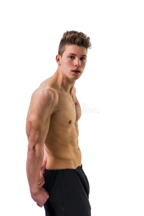 Красивый культурист делая изолированное представление Tricep Стоковое