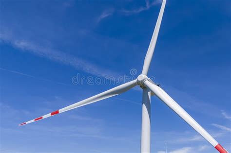 Green Electricity View Of Wind Farm Or Wind Park With High Wind Turbines For Generation