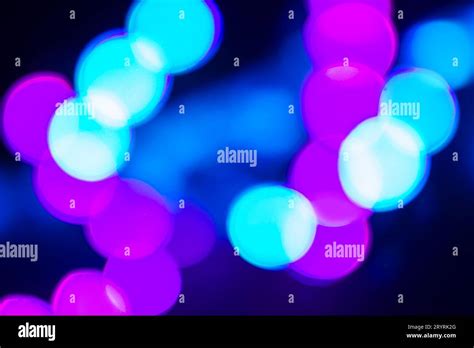Duotone Blue And Purple Abstraction Of Blurry Neon Lights On Black