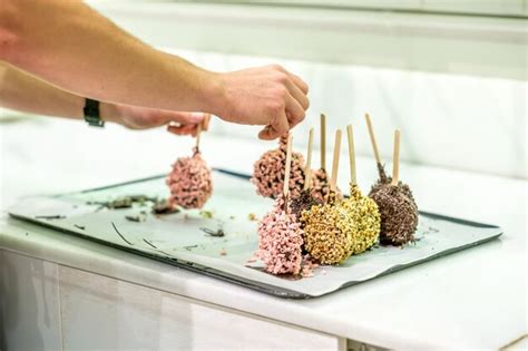 Premium Photo Donuts In Assortment At Confectionery