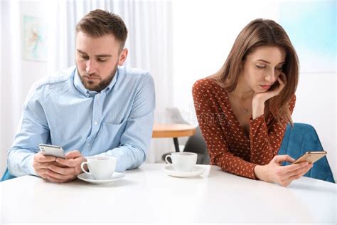Couple Addicted To Smartphones Ignoring Each Other Relationship Problems Stock Image Image Of
