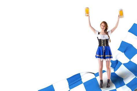 Premium Photo Oktoberfest Girl Holding Jugs Of Beer Against Blue And