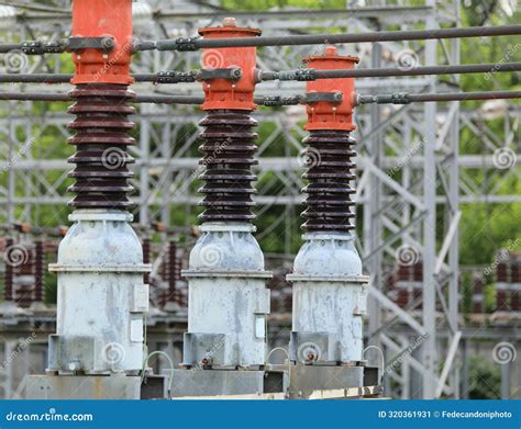 High Voltage Switches Towering Over The Power Plant Control The Flow Of