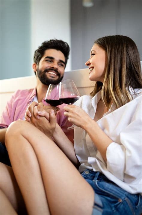 Intimate Sensual Young Couple In Bedroom Enjoying Each Other Stock