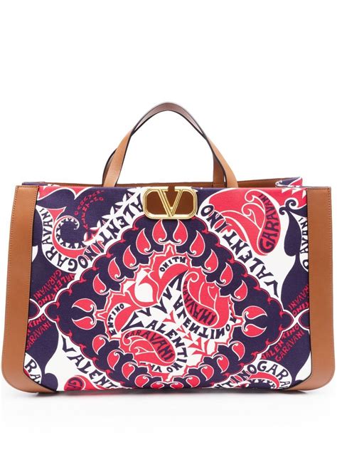 Valentino Garavani ヴァレンティノ・ガラヴァーニ Vロゴ シグネチャー ハンドバッグ ブルー Farfetch Jp