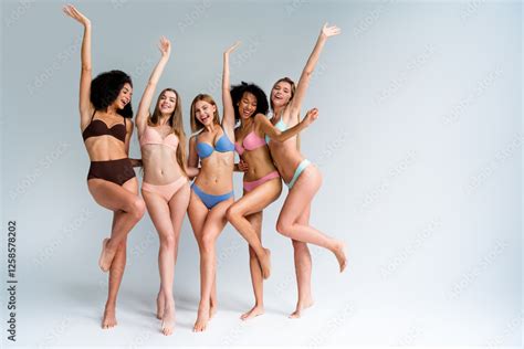 Full Size Photo Of Gorgeous Young Girls Friends Posing Model Dancing