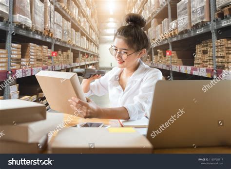 Woman Scanning Barcode Label Modern Warehouse Stock Photo Shutterstock