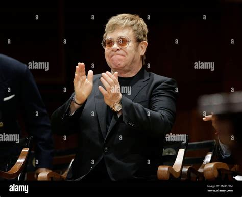 Musician Elton John Applauds Before Being Presented With The 2017