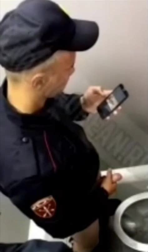 A Policeman Jerks In The Toilet