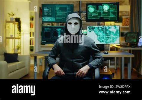 Dangerous Hacker Hiding His Identity Wearing A White Mask Stock Video