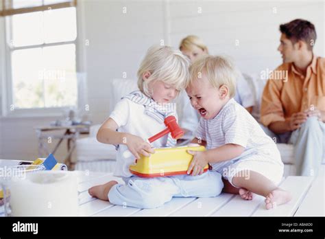 Siblings Fighting Over Toys Siblings Fighting Over Toys