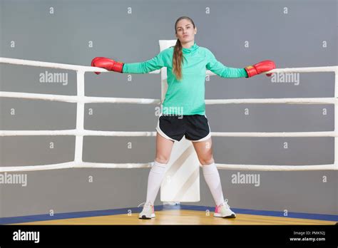 Confident Beautiful Young Athlete Woman With Collected Hair Standing In