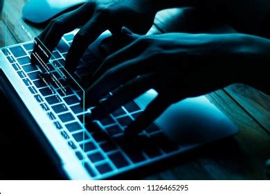 Photo Spotlighted Close Hands Typing On AI Generated Image Shutterstock