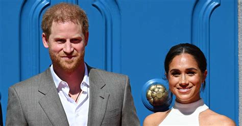 Meghan Markle Prince Harry Hold Hands In Germany Photos Us Weekly