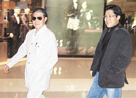 霍震霆谈复合笑容满面 霍启刚投身奥运工作图 搜狐娱乐