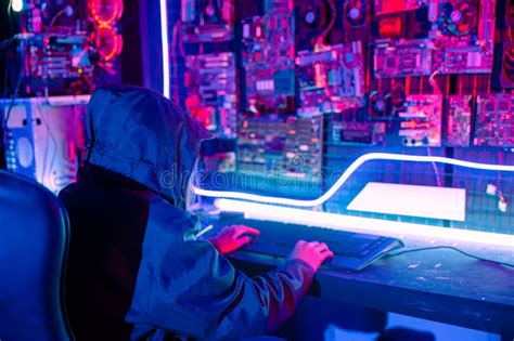 Woman Hacker Asian Woman Wearing Hood Is Typing Keyboard For Coding