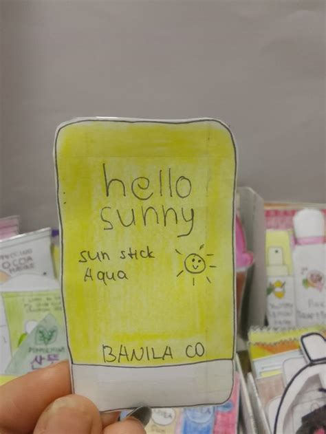 Someone Holding Up A Piece Of Paper That Says Hello Sunny