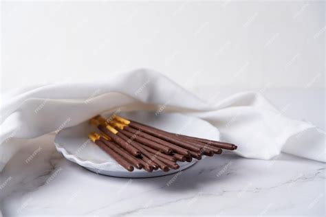 Premium Photo Pocky Of Chocolate On Plate Popular Sweet Of Japan