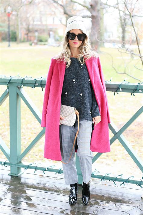 Download Elegant Woman Wearing A Pink Coat Wallpaper