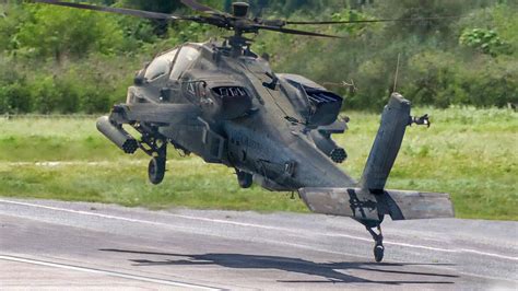 Us Apache Helicopter In Action During Intensive Target Demolition