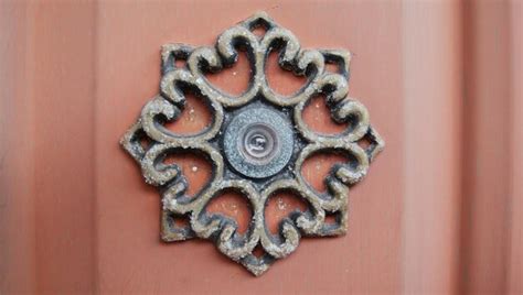 Premium Photo Close Up Of Peephole On Wooden Door