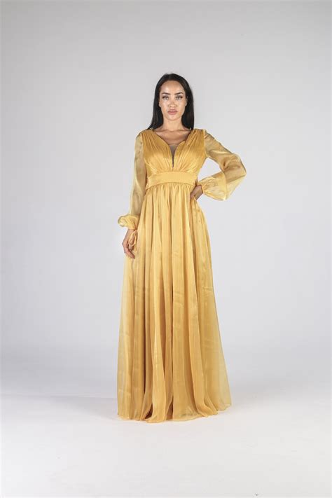 Sarı Işıltılı Kumaş Uzun Kollu Kuşaklı Abiye Elbise ALİS DRESS ElbiseBul