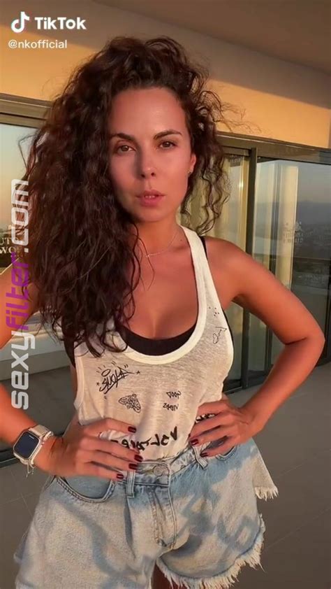 Sexy Nastia Kamenskykh Shows Cleavage In Black Sport Bra