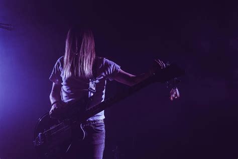 Woman In White Shirt Playing Electric Guitar Photo Free Lincoln Hall