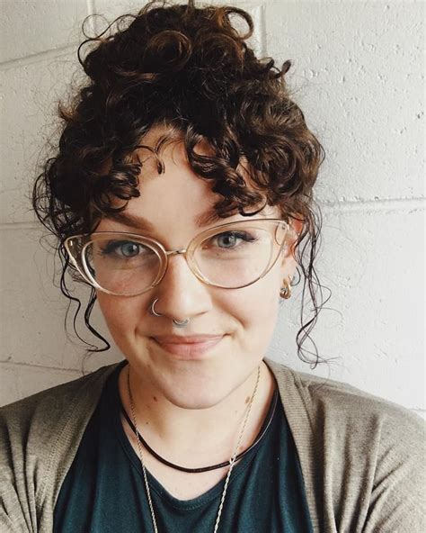 15 Smartest Messy Buns For Curly Hair