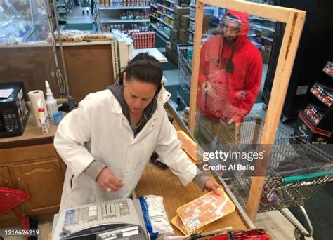Cashier Plexiglass Photos And Premium High Res Pictures Getty Images