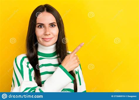 Photo Of Adorable Sweet Woman Wear Striped Sweater Smiling Pointing