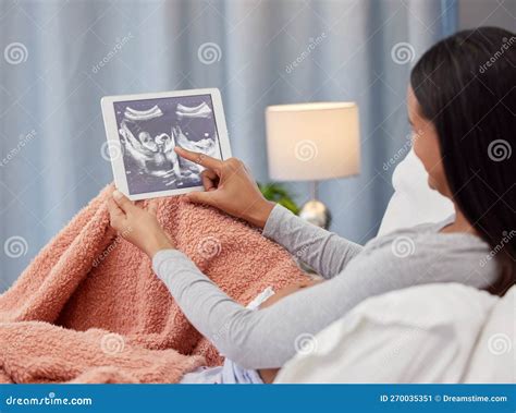 Pregnant Ultrasound Scan And Mother With Tablet In Bed With Digital X