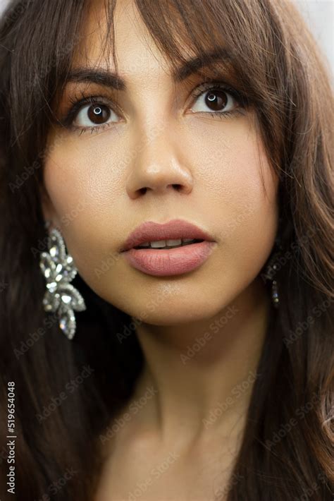 Beautiful Brunet Model Woman Face With Green Eyes And Perfect Make Up