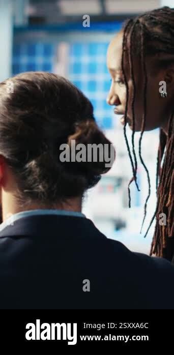 Vertical Video Photovoltaics Factory Manager Giving Tasks To Workers Asking Them To Adjust