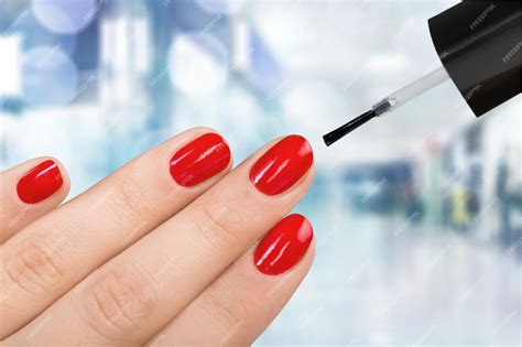 Premium Photo Beautiful Manicure Process Nail Polish Being Applied