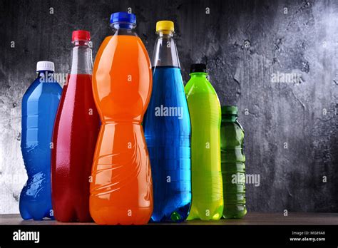 Plastic Bottles Of Assorted Carbonated Soft Drinks In Variety Of Colors