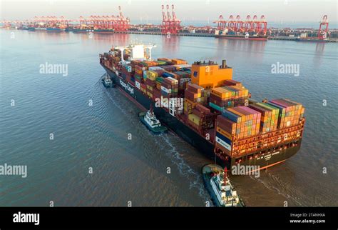 Shanghai China December 2 2023 A Container Ship Prepares To Dock At The Automated Terminal