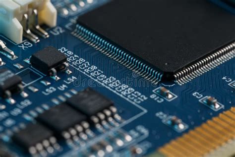 Electronic Circuit Board Close Up Processor Chips And Capacitors