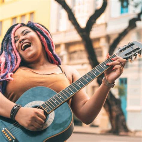 Hire Acoustic Guitar Player In Abu Dhabi Bella Entertainment