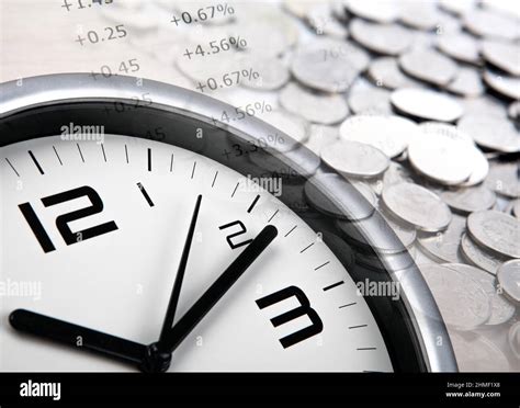 Pile Of Coins With Digits And Clock Face Close Up Stock Photo Alamy