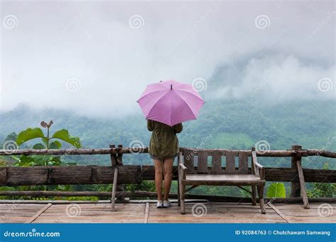 Woman Holding An Umbrella In The Rain Stock Image Image Of Adult